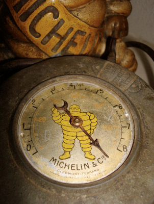 Anonymous Works: 1920's Michelin Man Cast-Iron Air Compressor