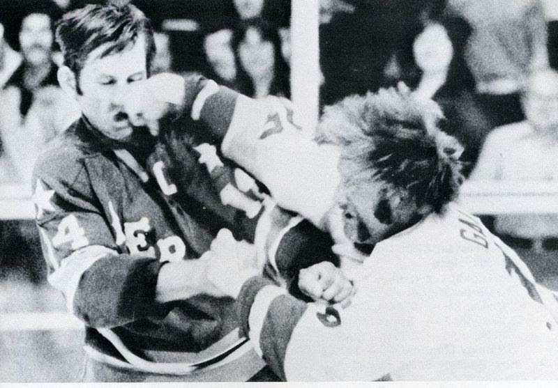The Minnesota Fighting Saints Gord Gallant land a hard right against ...
