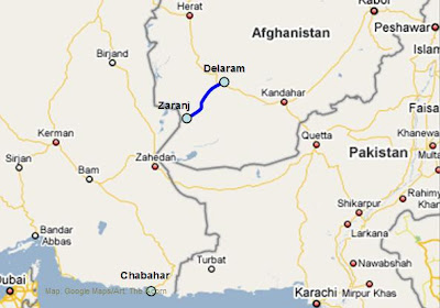 STILL HANGIN' ON A CROSS: Zaranj-Delaram highway. The other supply route