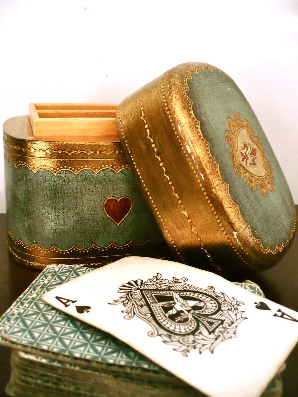 A Place for Tea: An antique box and a tatty old deck of cards..