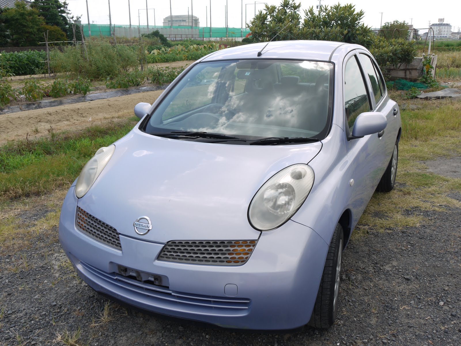 OKTTA ENTERPRISES INC.: NISSAN MARCH (2002), LIGHT BLUE