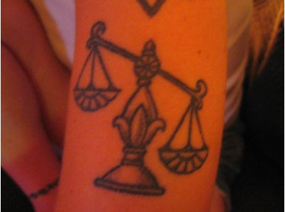 Scales libra tattoo design for hand