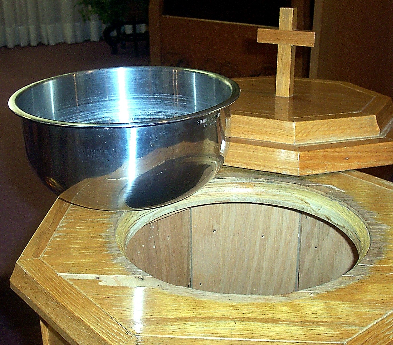 laughing pastor: baptism font...born again.