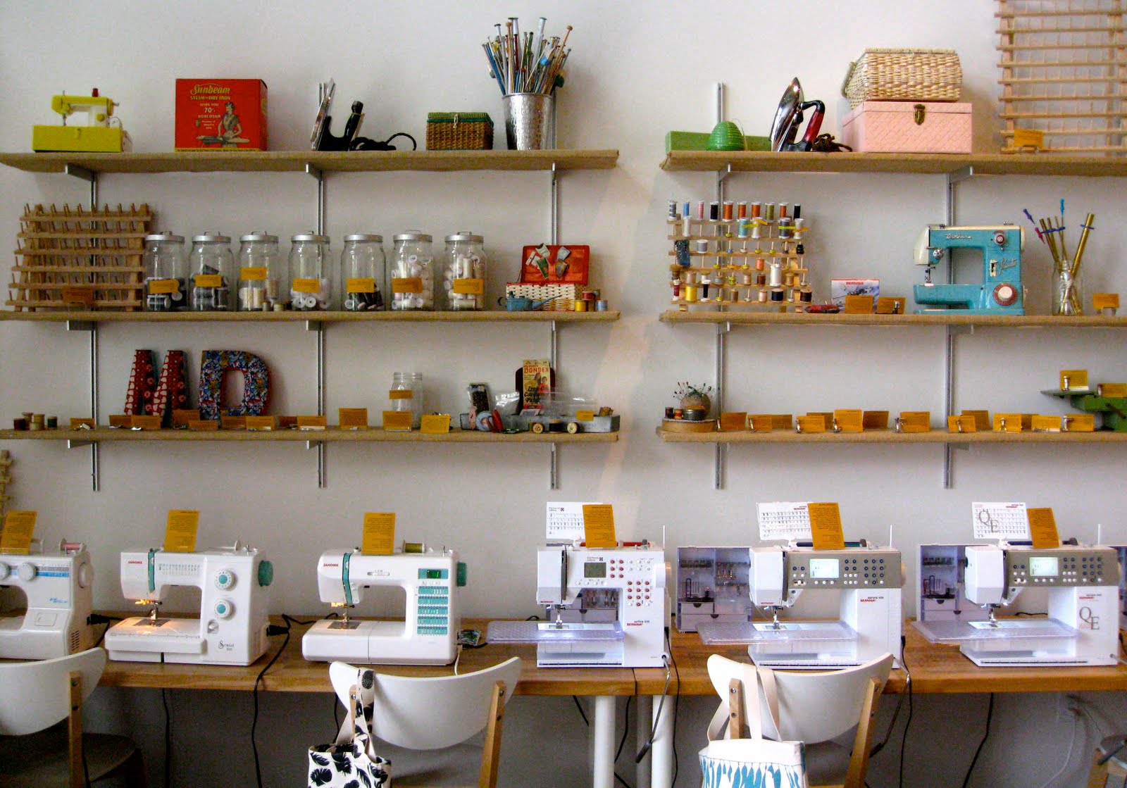 modern sewing studio | Sewing studio, Sewing room organization, Sewing ...