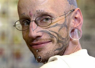 Welcome to FunnyDust: Insane Face Tattoos (29 Photos)