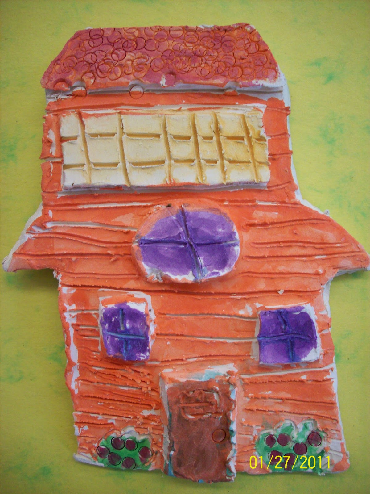Center School Art: Clay Houses by Grade 4