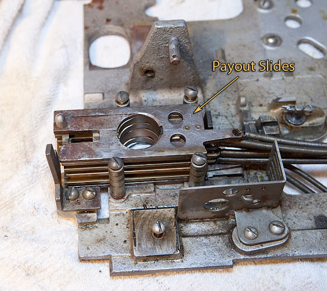 Restoring a Vintage Slot Machine: Horizontal fingers and payout slides