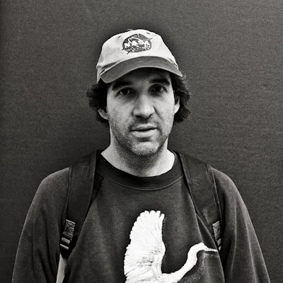 A Photographer: Deadpan