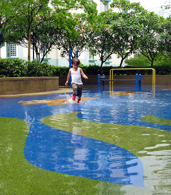 From Rebecca's Kitchen Window: Puddle Jumping on the Playground