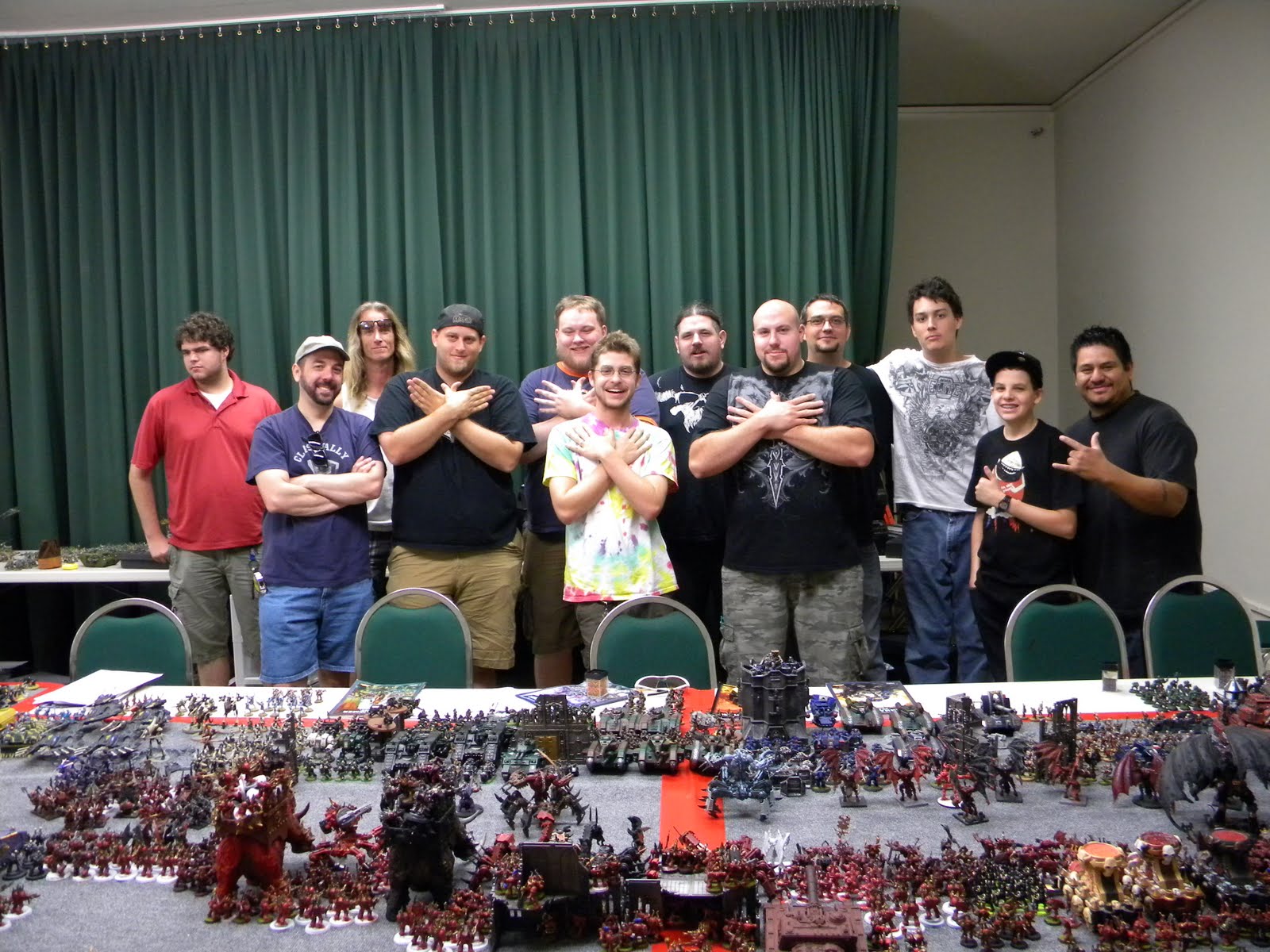 When people make the "sign of the Aquila" with their hands, how do they ...