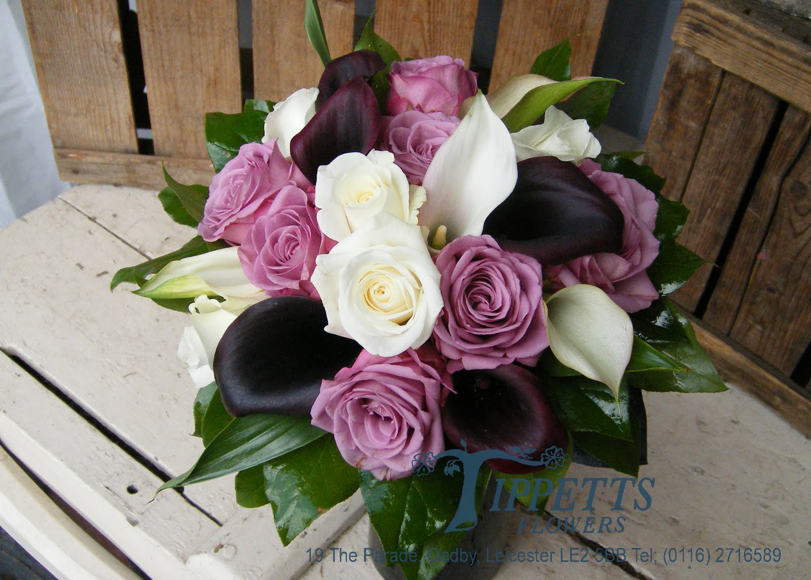 Tippetts Florist Flowers Oadby: Lilac Rose and Cala Lily hand tied boq