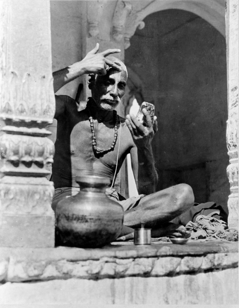 Brahman Priest Painting his Forehead with the Red and White Marks of ...