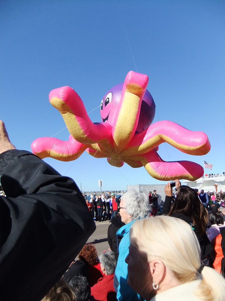 one boy, one girl: Holiday Bowl's Big Bay Balloon Parade