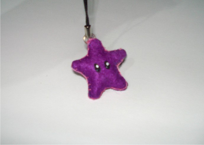 Marcecharitas: Estrellitas en color morado con ojitos.