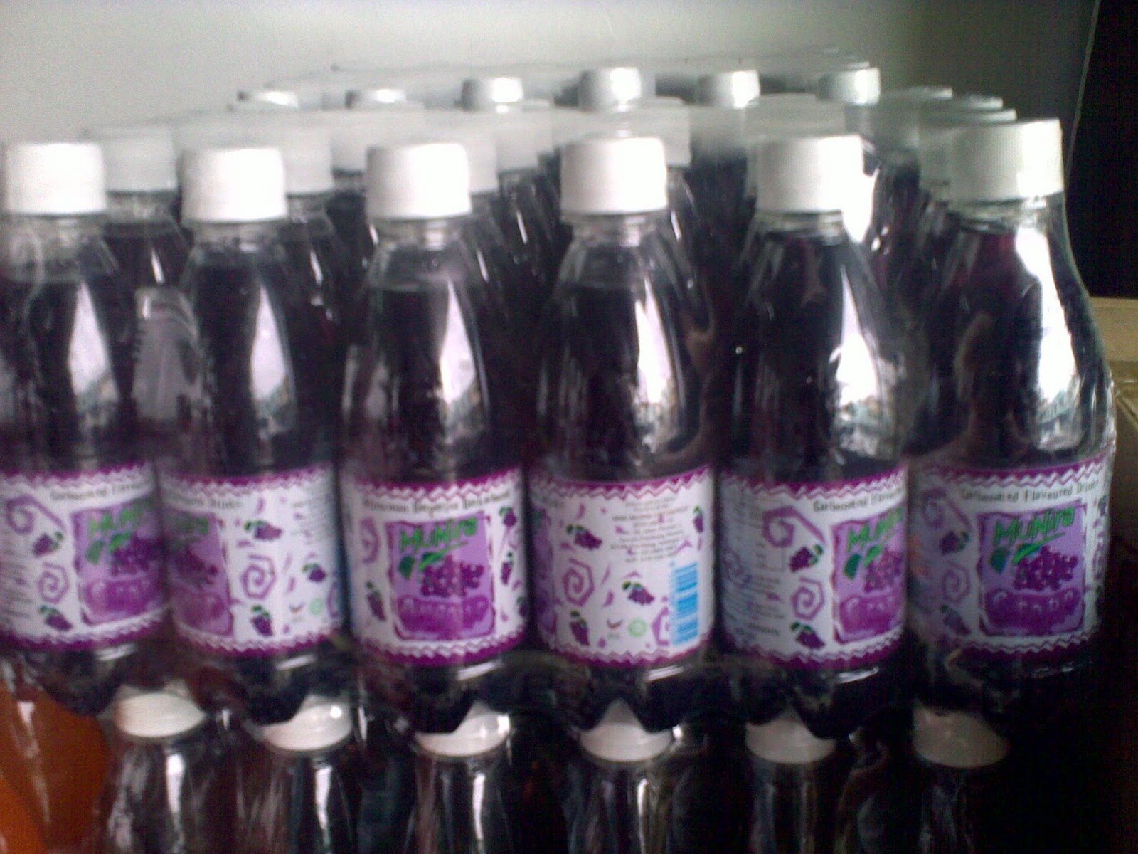 JUS MUNIRA Dan Minuman Buah-buahan Berkarbonat MUNIRA