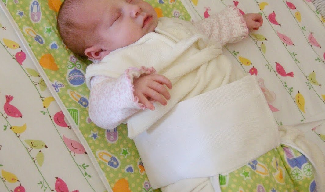 Our Wolfe Pack: A bed wedge, a Danny Sling, and one sad Mama...