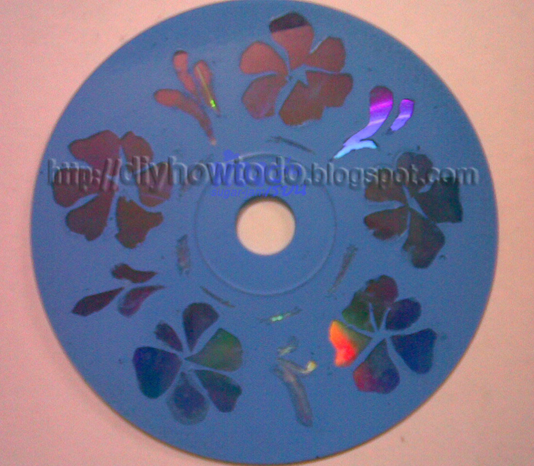 DIY old CD to art work or decoration. - D . I . Y . Done ! It 's Yours