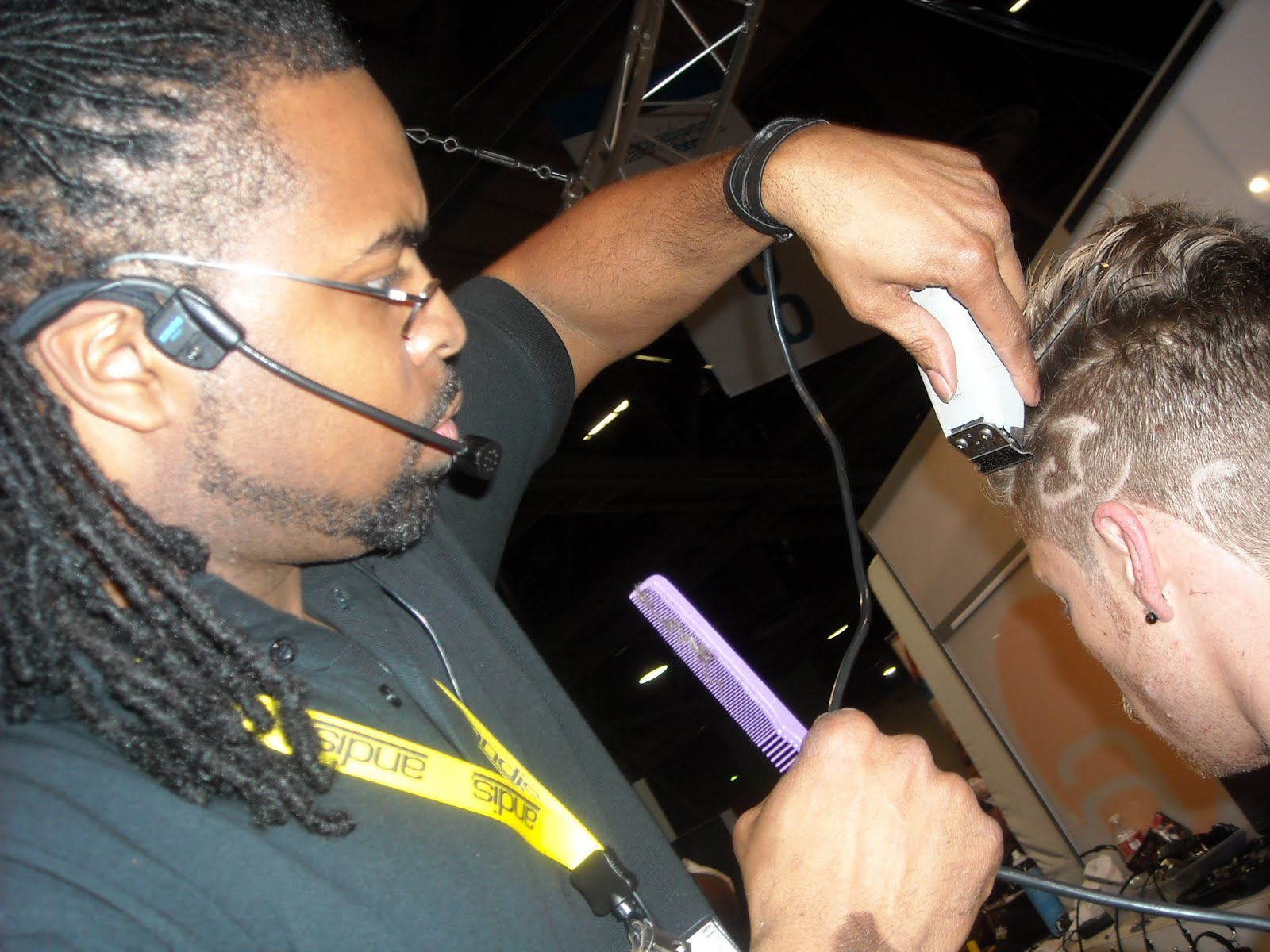 Andis Company: Eric Cheek on stage at Andis