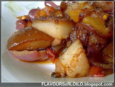 "Kinamatisang" pork fat and skin