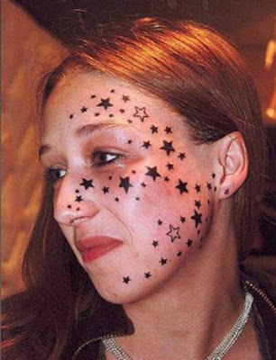 A girl has 56 stars instead of 8 stars on her face