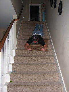 The Peterson Family: Stair Sledding
