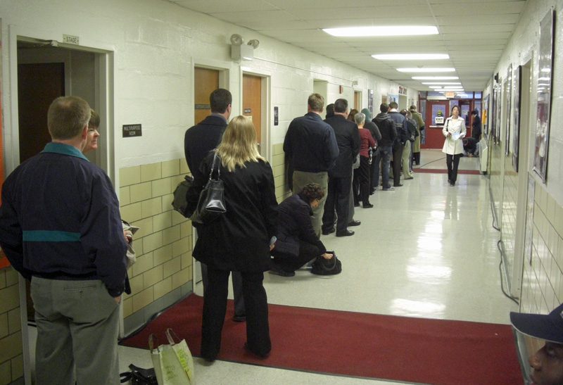 Ode Street Tribune: people lining up to vote