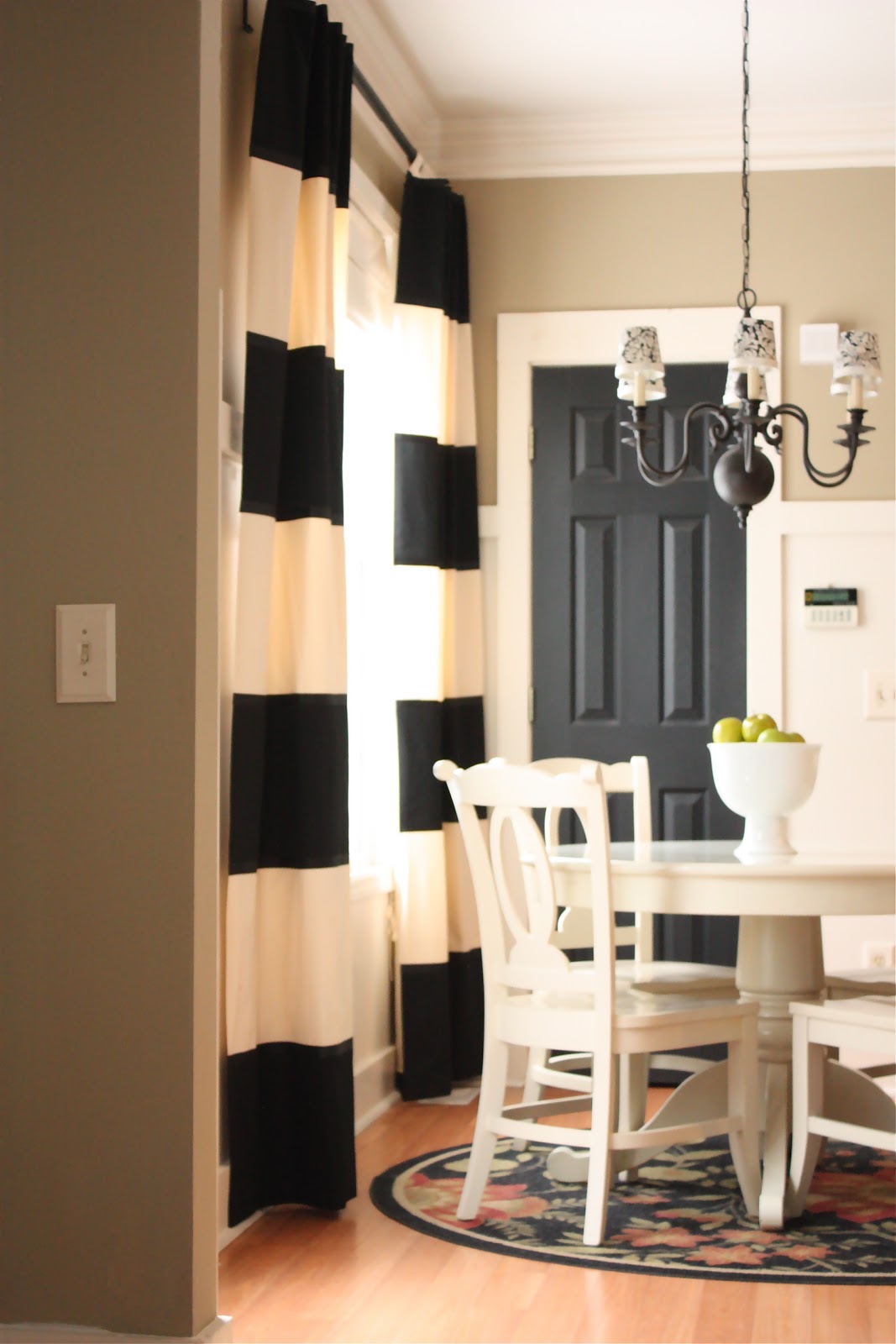 Love these horizontal block stripe curtains for a staging project ...