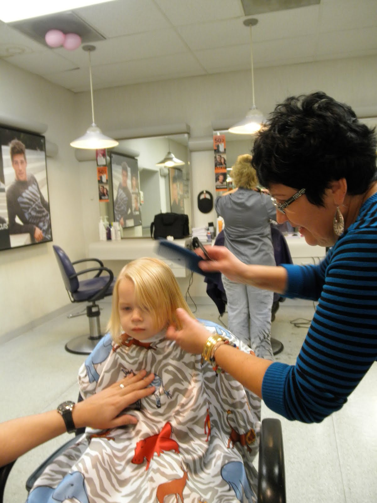 Karnes Family Blog: Cami's first haircut...