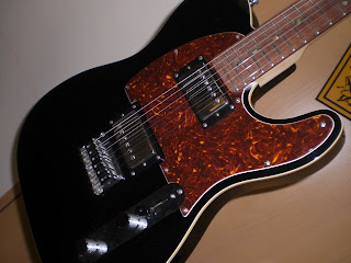 COLIN'S CORNER: Tele Me Again, About Those Combat Custom Guitars.